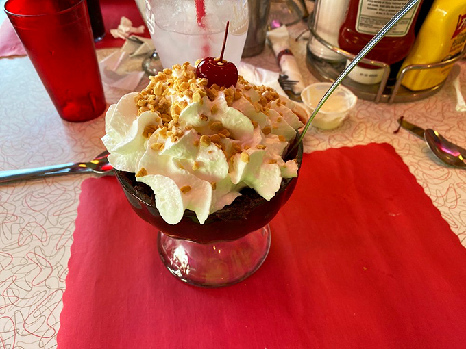 This isn't just dessert—it's therapy in a glass. The hot fudge sundae that makes you forget your troubles and remember why spoons were invented.