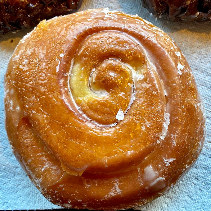 Behold, the cinnamon roll in its natural habitat. It's not just breakfast, it's a warm hug for your taste buds.