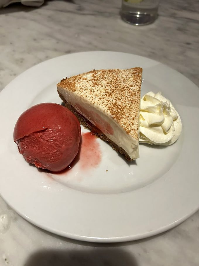 A slice of heaven with a scoop of paradise! This classic cheese pie and raspberry sorbet duo is the grand finale your taste buds deserve.