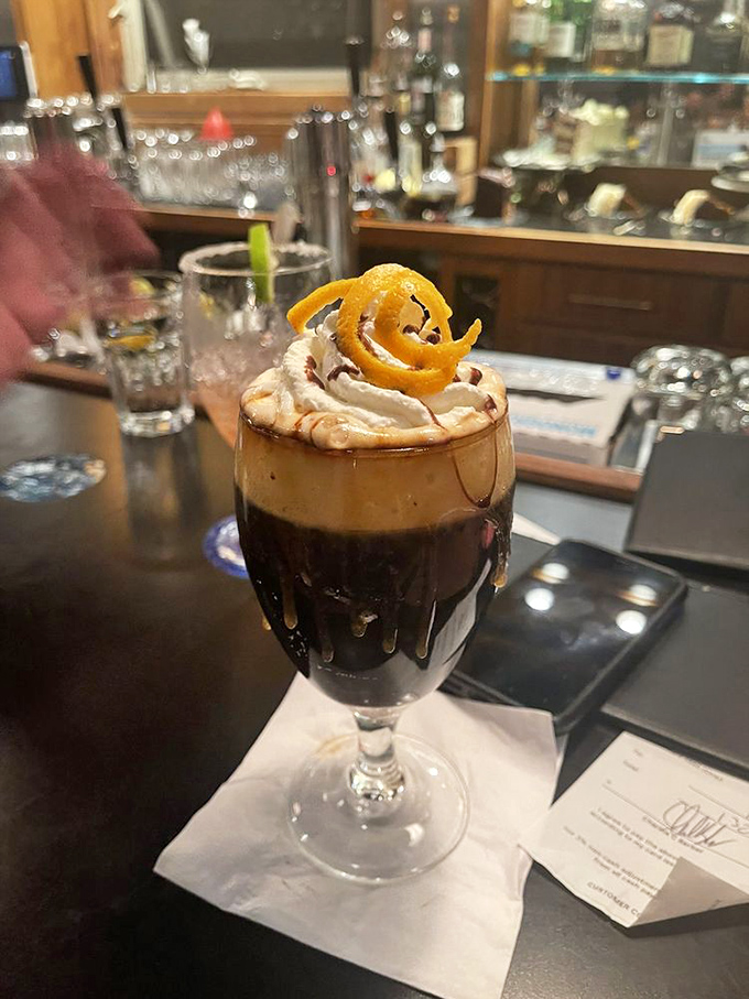 A coffee that's dressed to impress, topped with a citrus twist. It's the caffeinated equivalent of wearing a tuxedo to the beach.