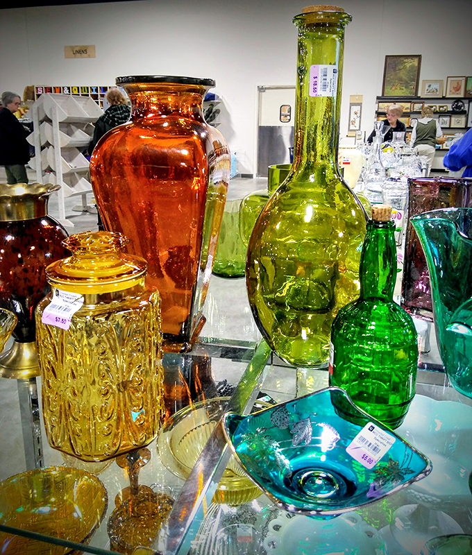 A rainbow of vintage vessels! These colorful vases are ready to brighten up your windowsill or add a pop of personality to your next dinner party.