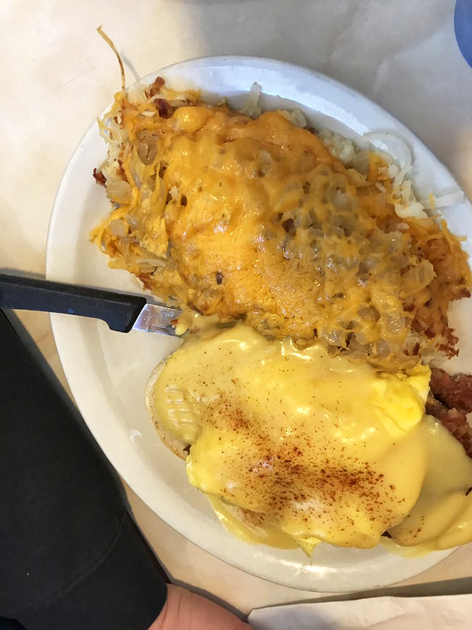 Eggs Benedict, Dairyland style! This plate is strutting its stuff like it knows it's the Beyonc&eacute; of breakfast.