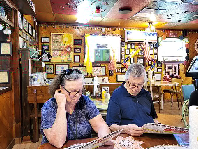 Diners deep in thought &ndash; probably deciding between the "Famously Foxfire" options. The struggle is real when everything looks finger-lickin' good!