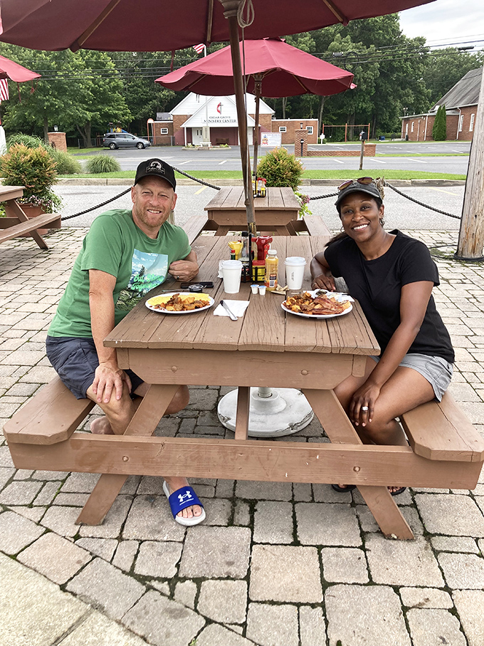 Happy diners, sunny skies, and plates piled high &ndash; looks like these folks have found their slice of Maryland paradise!