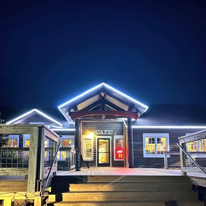 As night falls, the Rustic Inn Cafe becomes a beacon of warmth and welcome. It's like a lighthouse, but instead of ships, it guides hungry souls.