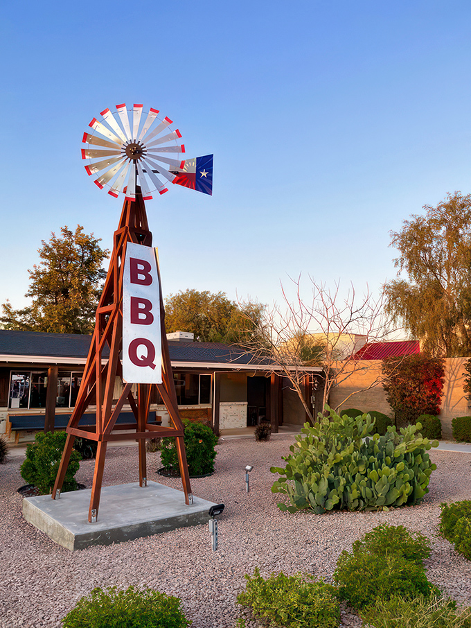 The BBQ beacon of hope! This windmill sign is like a lighthouse, guiding hungry sailors to a safe harbor of deliciousness.