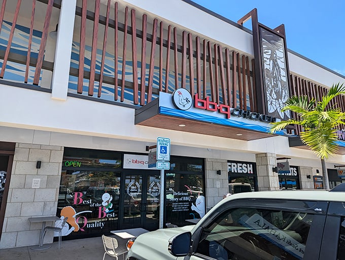 Daytime reveals bb.q Chicken's place in the Kahala community. Nestled among palm trees and island sunshine, it's Korean comfort food with an Aloha spirit.