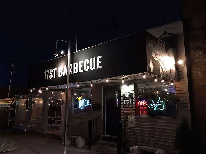As night falls, the beacon of barbecue shines bright, guiding hungry pilgrims to their smoky sanctuary.
