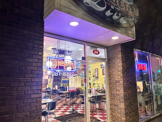 Night or day, the burger beacon shines! The Burger Dive's evening glow is like a lighthouse for lost and hungry souls. Follow the neon to flavor town!