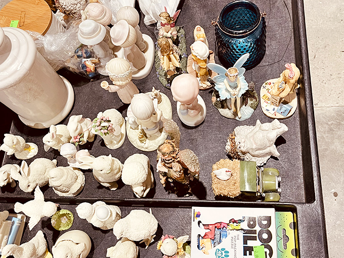 Porcelain figurines stand in frozen elegance, little ambassadors from another era when china cabinets were the showcase of every proper home.