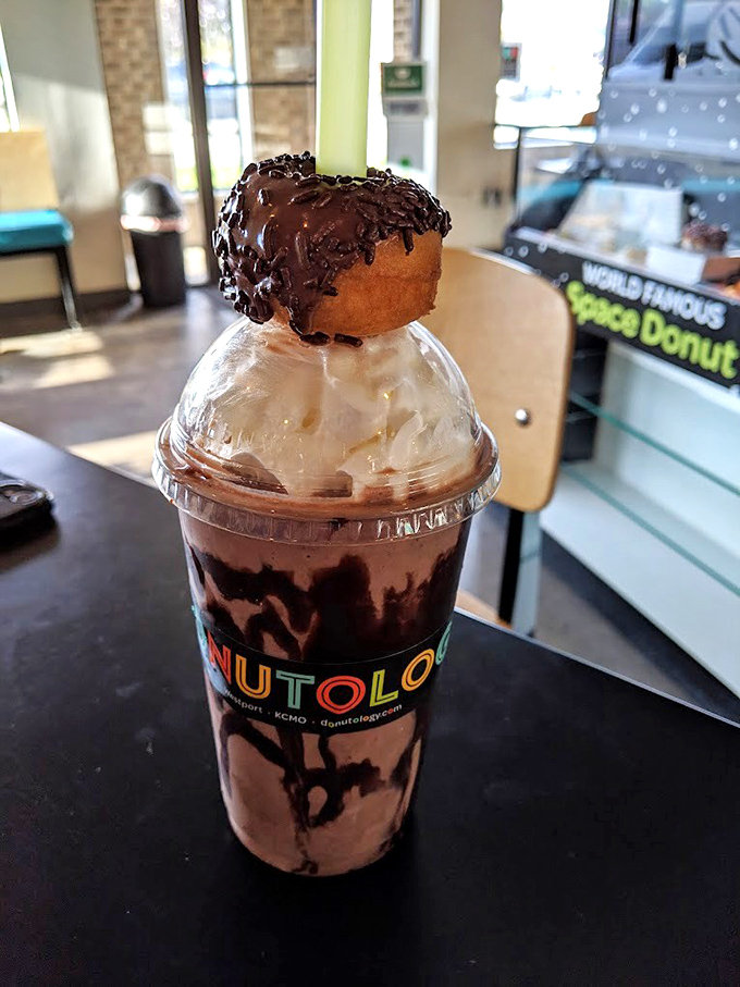 The ultimate pick-me-up! This Frappuccino topped with a donut is like coffee and dessert had a baby, and it's beautiful.