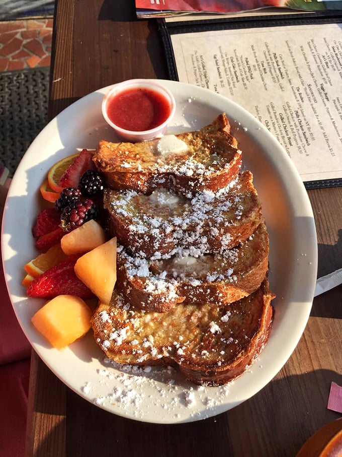 French toast that's dressed up fancier than you on prom night. It's breakfast masquerading as dessert, and we're not complaining.