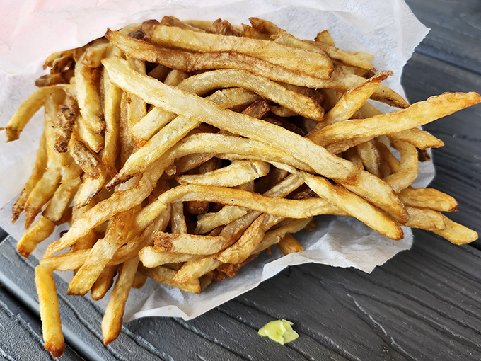 Fries so golden, they belong in Fort Knox. Crispy on the outside, fluffy on the inside – it's potato perfection!
