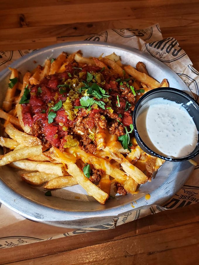 Loaded fries that require a game plan before attacking. The cheese-to-topping ratio here is what mathematicians call "the golden ratio of deliciousness."