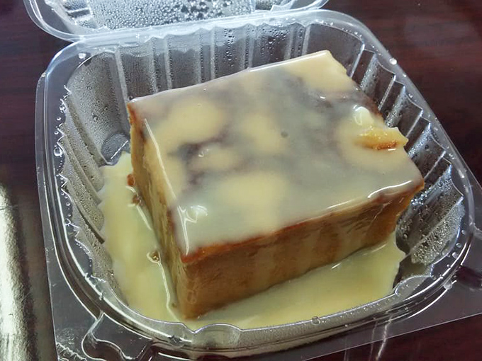 Bread pudding that'll make you weak in the knees. It's like a warm hug for your taste buds, with extra sauce.