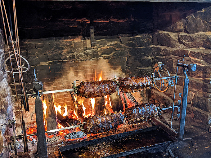 Where there's smoke, there's flavor! This in-house barbecue setup is like a meaty merry-go-round, promising a carnival of tastes with every revolution.