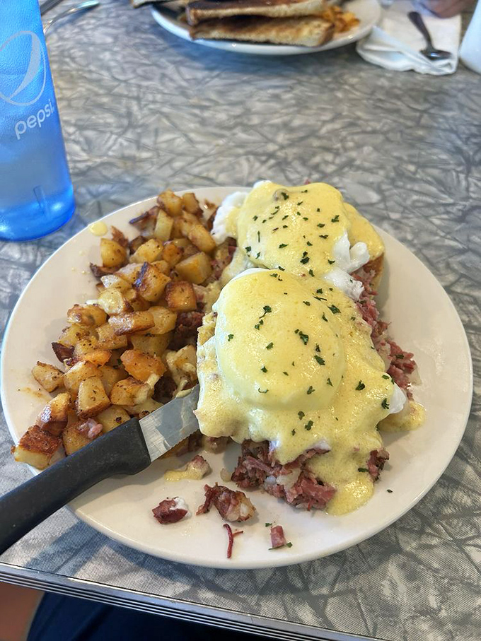 Irish eyes are smiling on this Benedict! With perfectly poached eggs and a generous helping of corned beef hash, it's a St. Patrick's Day party on a plate.
