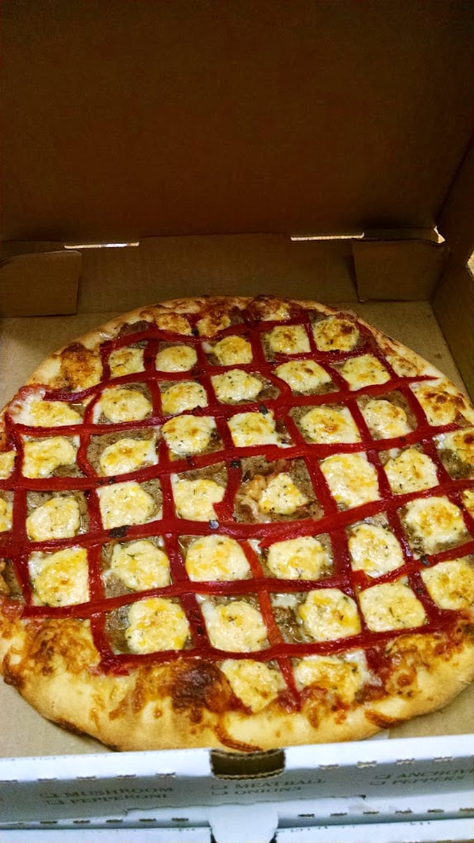 This lattice-topped pizza is like modern art you can eat. It's so pretty, you almost don't want to slice it. Almost.