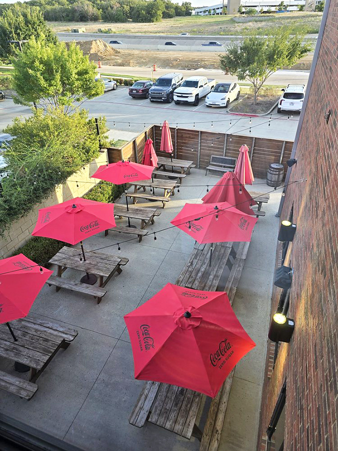 An outdoor seating area that's perfect for savoring your smoky treasures. Those red umbrellas? They're not for shade &ndash; they're victory flags for your taste buds!