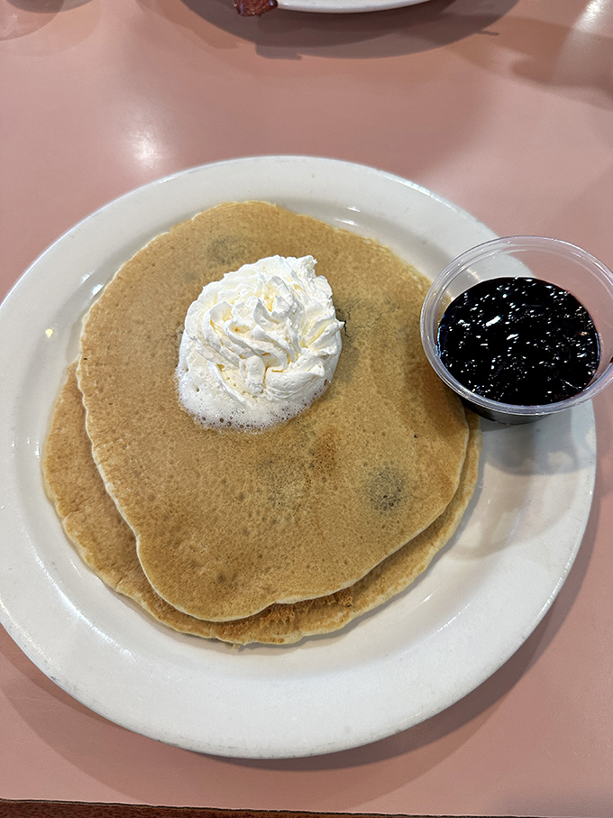 Pancakes so fluffy, they might float away if not for that dollop of butter. Add some syrup, and you've got breakfast nirvana on a plate!