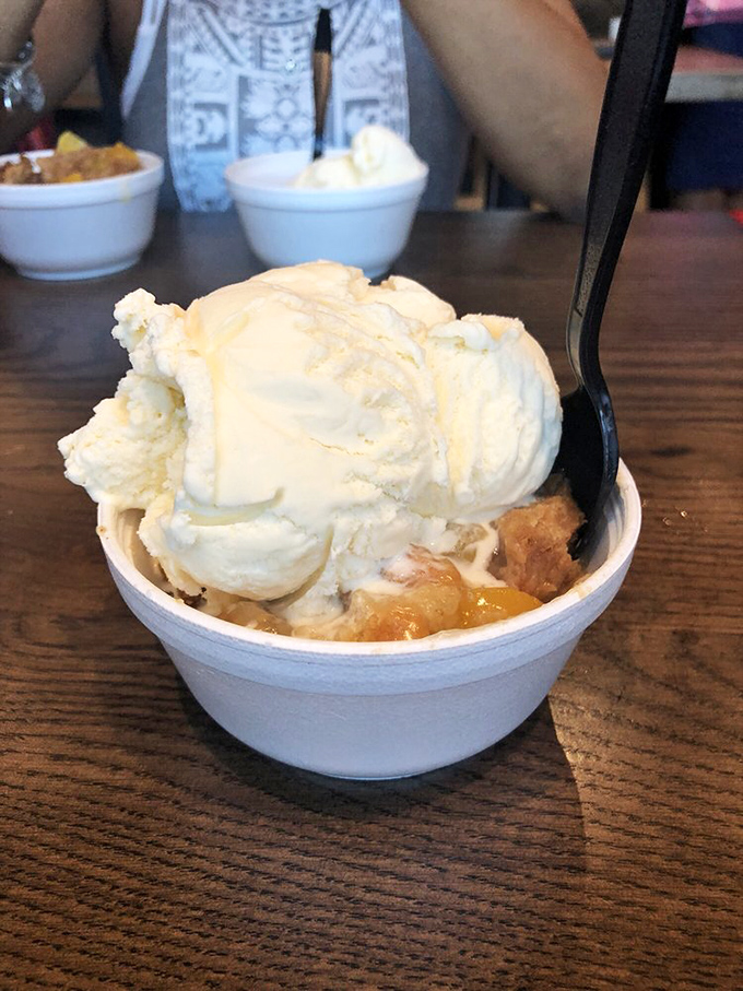 Sweet, peachy dreams! This peach cobbler à la mode is the grand finale your taste buds deserve after their spicy performance.