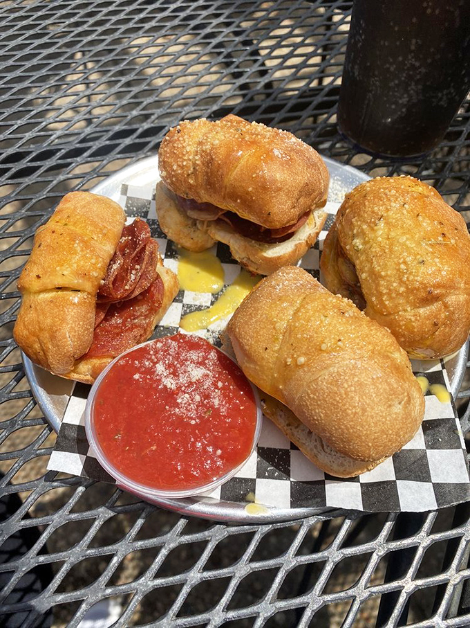 Pepperoni squares: the geometric wonder of the pizza world. Each bite is a perfect equation of crust, sauce, cheese, and spicy pepperoni goodness.