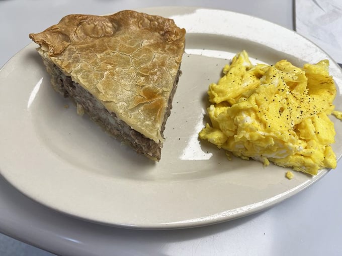 Pork pie meets scrambled eggs in a breakfast rendezvous. It's like the British Invasion, but for your taste buds!