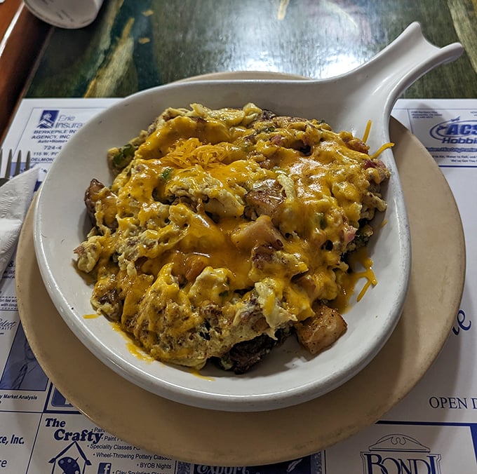 Behold, the skillet: Where vegetables pretend to be healthy while swimming in cheesy, meaty goodness. A delicious deception!