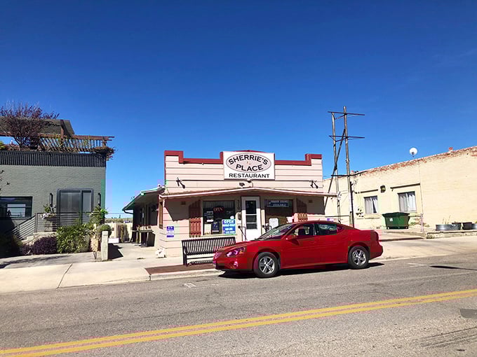 Small-town charm, big-time flavor! Sherrie's Place stands proud on this quiet street, a beacon of hope for hungry travelers and locals alike.
