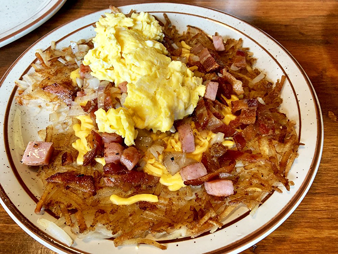 A breakfast fit for a railroad baron! This hearty plate of hash browns, eggs, and ham is so satisfying, you'll feel like you own the whole railroad.