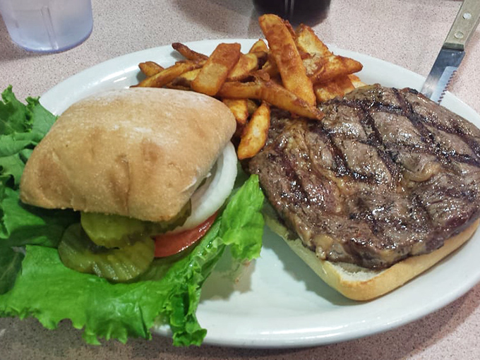 The Ribeye Steak Sandwich: Where 'medium rare' meets 'medium awesome'! A beefy behemoth that'll make your taste buds do a happy dance.