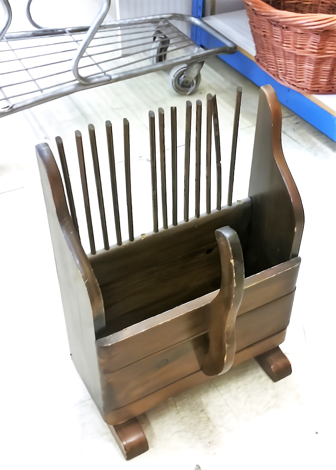 Not just a scoop, but a slice of history! This cranberry harvester is ready for its second act in your rustic decor.