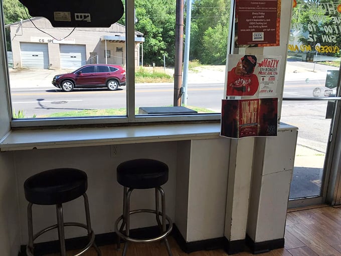 Window seat to barbecue heaven. These stools offer front-row tickets to the mouthwatering show that is Jim's Rib Haven.
