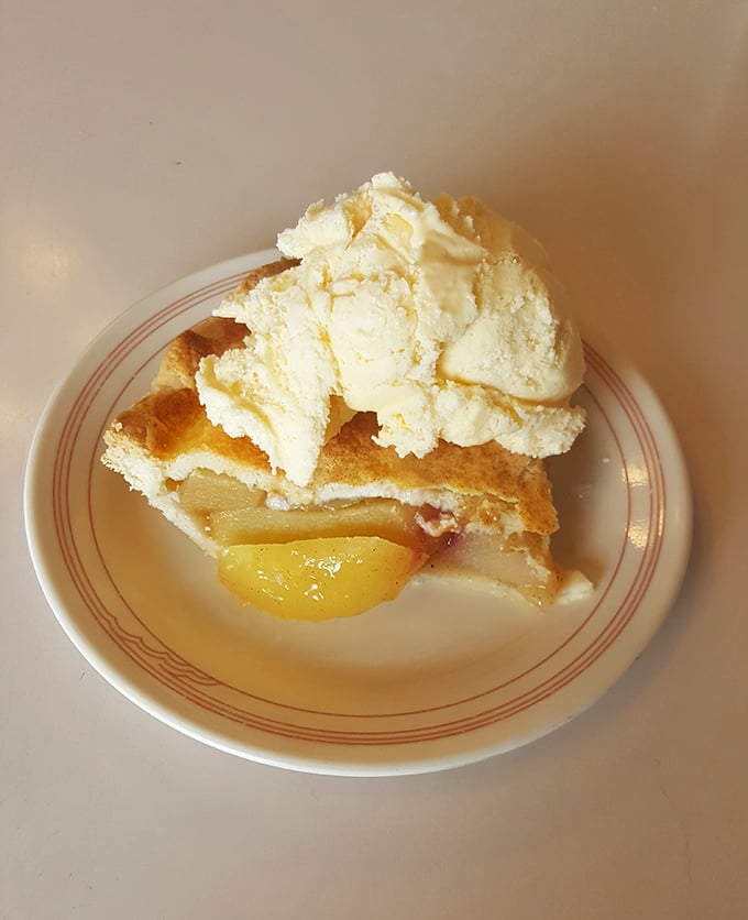 The apple of my pie! Golden, flaky, and topped with a scoop of vanilla ice cream &ndash; this is the dessert equivalent of a warm hug.
