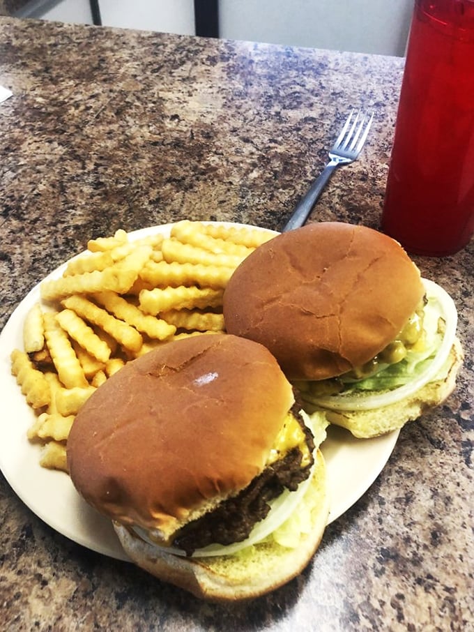 Dynamic duo alert! This classic burger and fries combo is the Batman and Robin of the comfort food world &ndash; unstoppable and utterly satisfying.