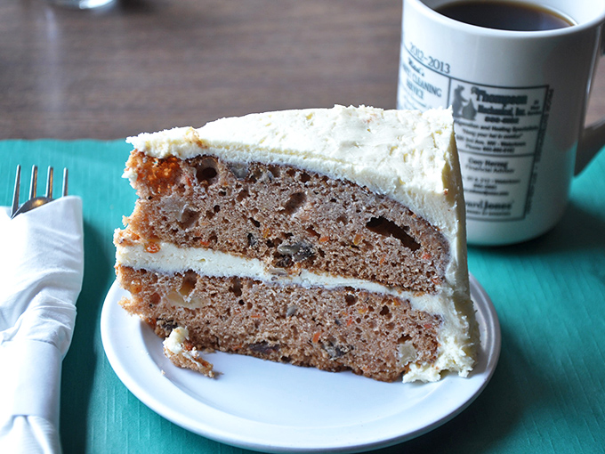 Layer upon layer of moist perfection. This cake isn't just dessert, it's an engineering marvel that would make Frank Lloyd Wright weep with joy.