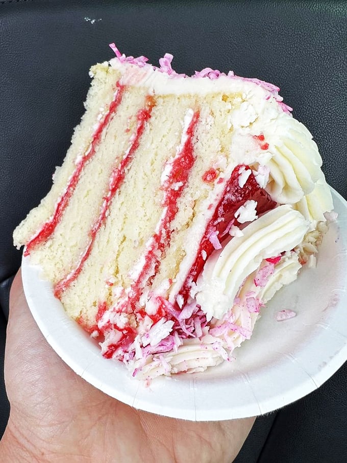 Layer upon layer of pure joy! This cake is a towering testament to the power of dessert, with each bite promising a ticket to flavor nirvana.