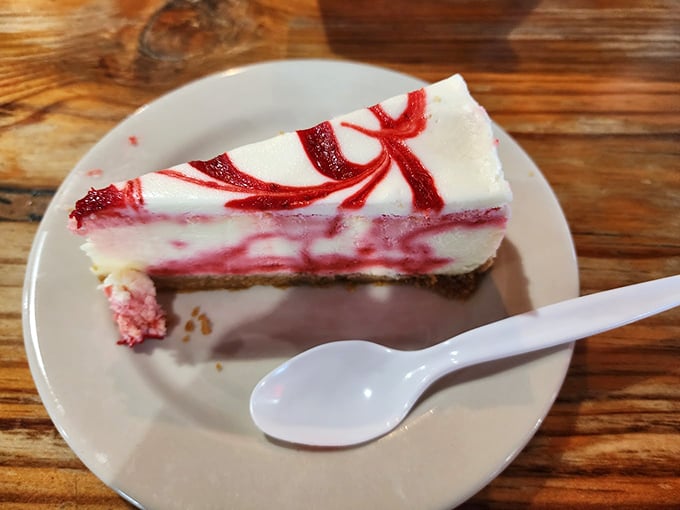 A slice of raspberry swirl cheesecake that somehow manages to be both light and decadent&mdash;the dessert equivalent of having your cake and eating it too.