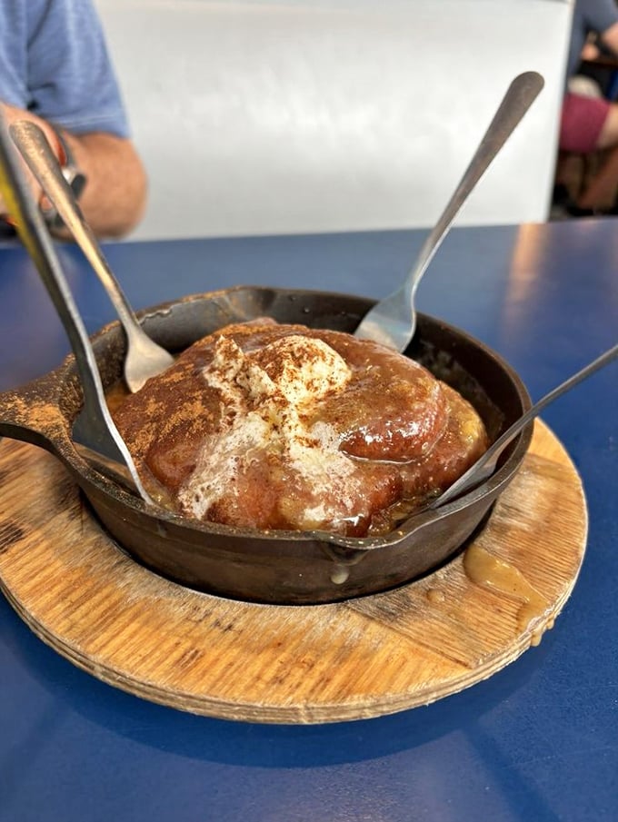 Cinnamon roll or edible work of art? This gooey, spicy spiral is what breakfast dreams are made of. Fork optional, napkins mandatory.
