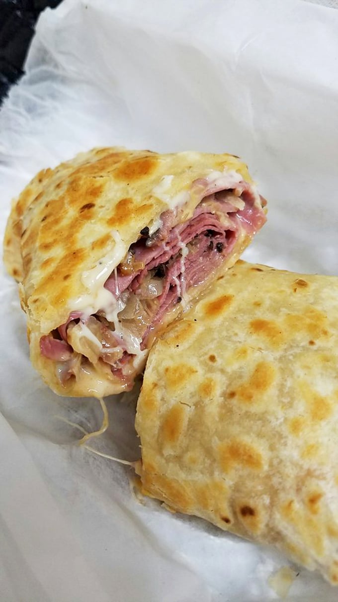 Layer upon layer of deli perfection. This sandwich isn't just a meal, it's an edible work of art worthy of the Louvre.