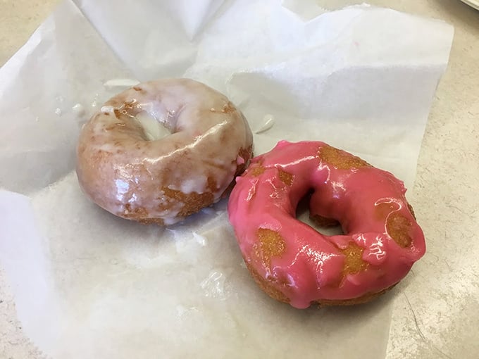 Donuts that didn't need an artisanal backstory or exotic glazes to win your heart. One classic, one strawberry, both making a compelling argument against diets.