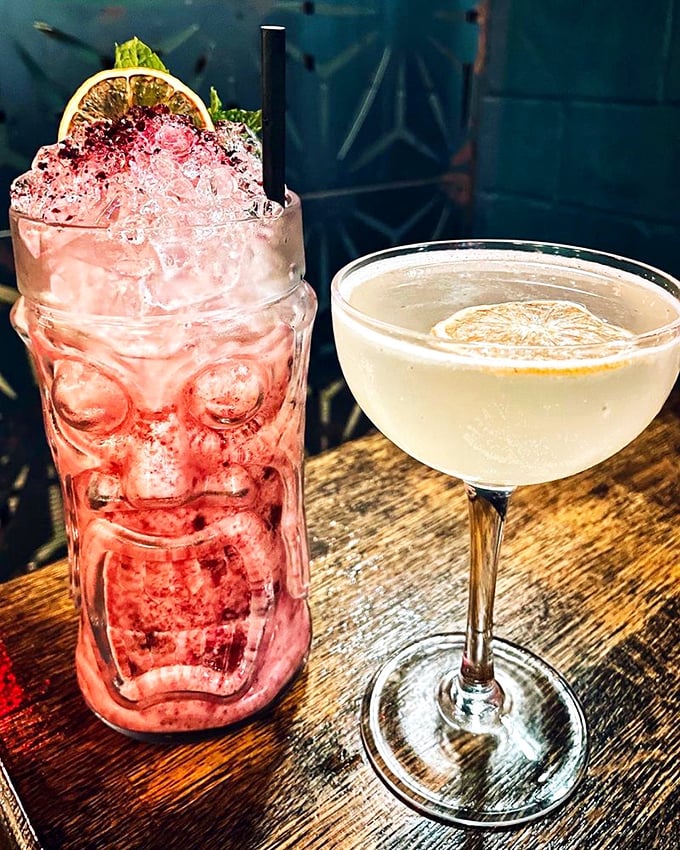 Cocktails that look like they belong in both an art gallery and your hand immediately. The tiki mug adds a touch of playful drama.