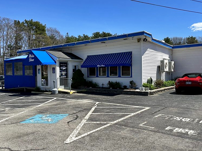 The little diner that could! With its cheerful blue awnings and inviting entrance, it's no wonder this place has been a local favorite for decades.