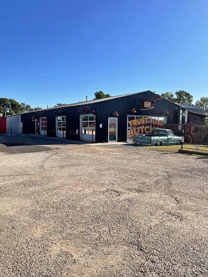 The gateway to gastronomic bliss! This entrance might look simple, but beyond those doors lies a world of smoky, savory wonders. Are you ready?