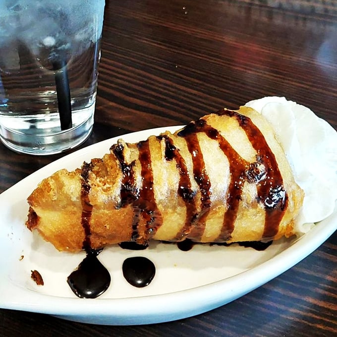 Fried cheesecake: because sometimes your dessert needs a little adventure too. It's like your grandma's cheesecake went to the state fair and never looked back.