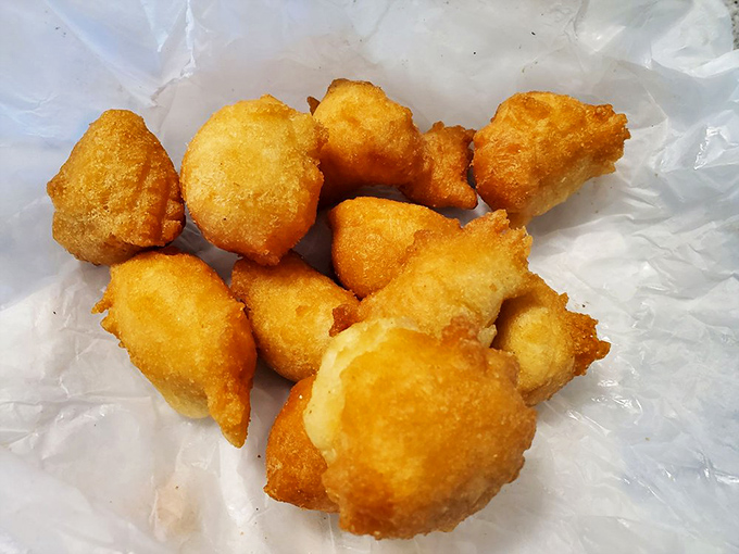 Little golden nuggets of joy! These hush puppies are the perfect sidekick to any BBQ feast &ndash; crispy, fluffy, and utterly irresistible.