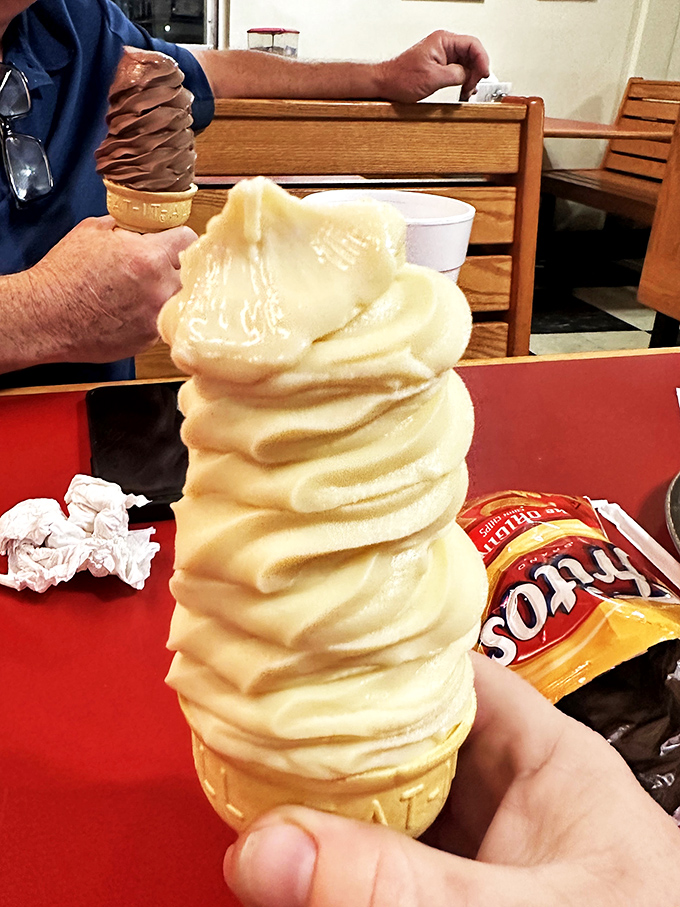 The Leaning Tower of Soft Serve! This ice cream cone defies gravity and willpower - good luck resisting its siren call.