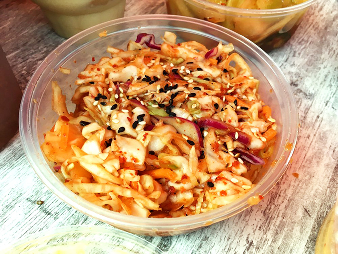 This isn't just slaw, it's a flavor fiesta in a bowl. Kimchi kicks this classic side up several notches.