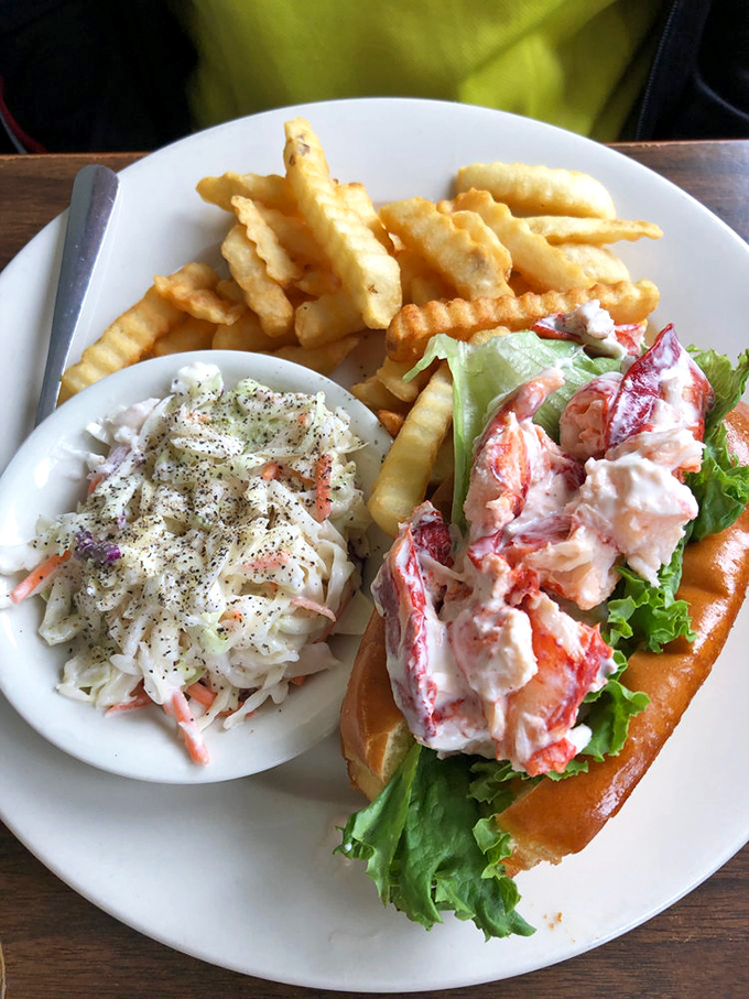 The lobster roll arrives like Maine's greatest hit on a plate&mdash;sweet meat nestled in a buttery vessel, making tourists weep and locals proud.