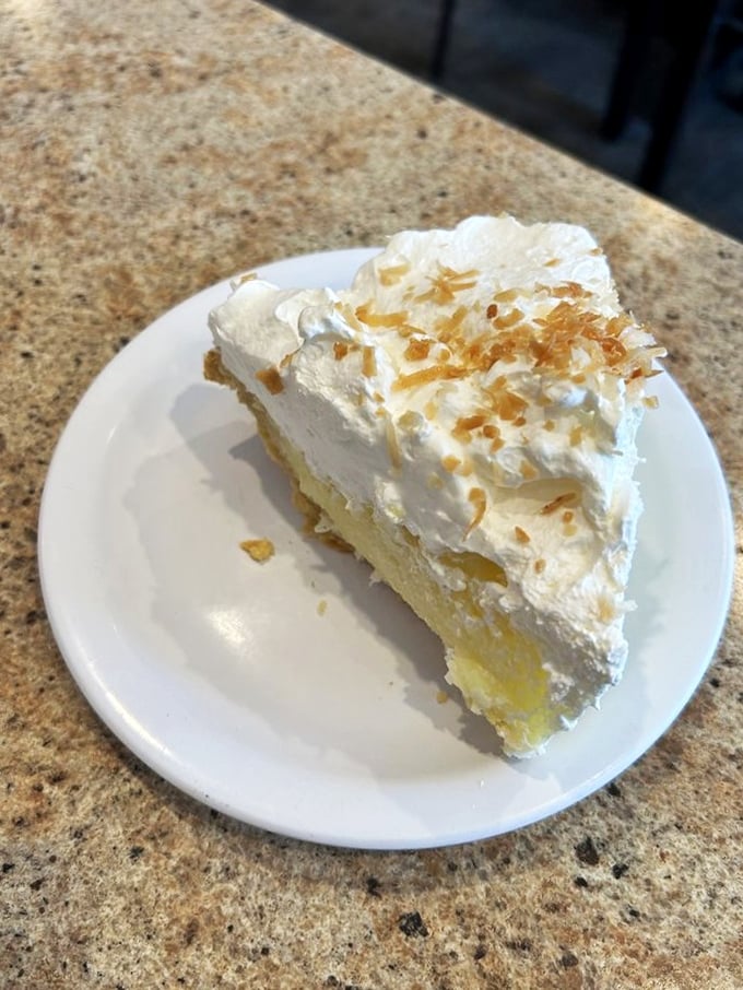 This isn't just pie, it's a slice of heaven. With a cloud of whipped cream so light, it might just float right off your plate.